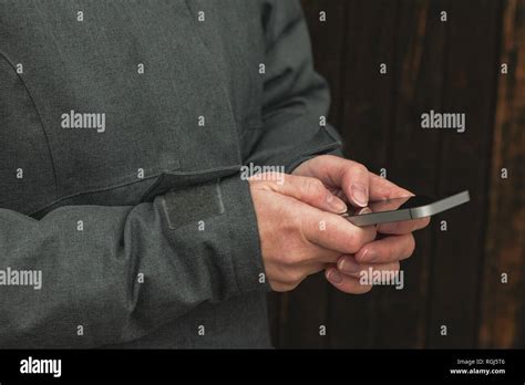 Woman Is Using Smartphone On Street In Winter Casual Adult Female Is