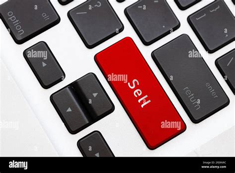 Closeup Keyboard Sell Word Text Button For Bear Stock Forex Trade Order