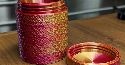 Cylindrical Jar With Triangle Pattern And Threaded Lid By Tonydelite