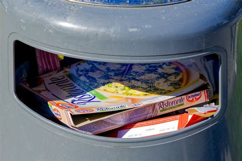 Close Up Of A Garbage Can Containing Empty Cardboard Food Boxes