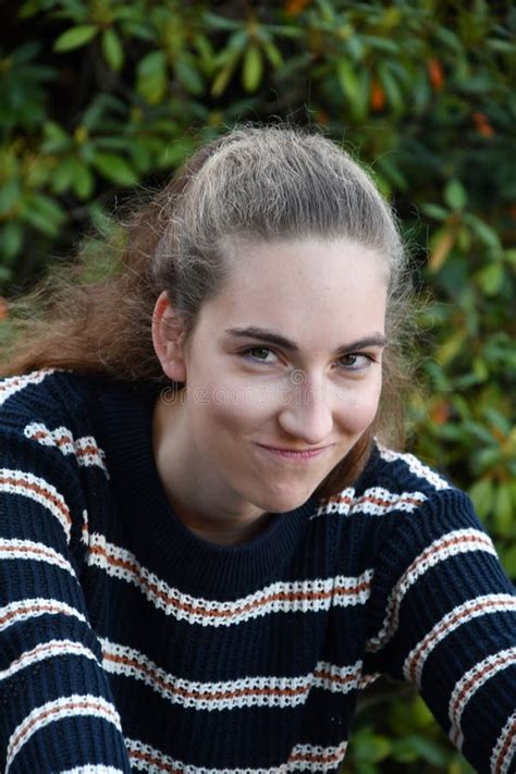 Whimsically Smiling Young Woman Stock Image Image Of Eyes Flirt