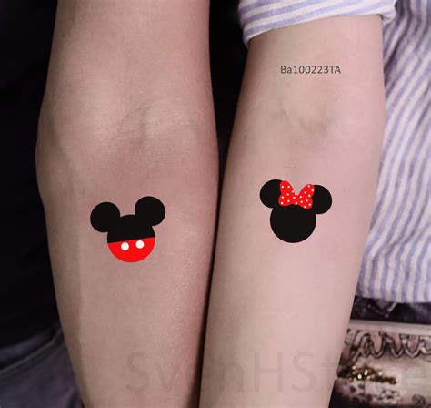Minnie Mouse And Mickey Mouse Kissing Tattoo