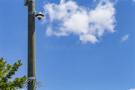 Security Camera And Urban Video In Front Of Blue Sky Outdoor Cctv
