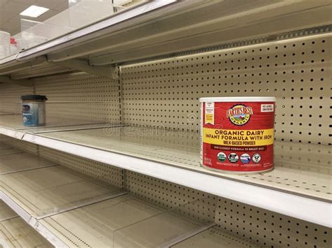 A Baby Formula Display Sits Empty At Supermarket As A Result Of