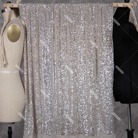 Vertical Stripe Silver Sequins On Stretch Beige Mesh Oneyard