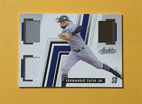 2019 PANINI ABSOLUTE FERNANDO TATIS JR ROOKIE TRIPLE RELIC AB FT