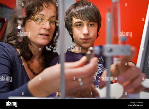 Babe And Teacher At Physics Class Stock Photo Alamy