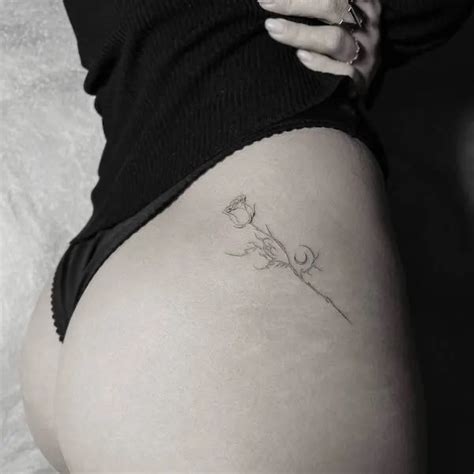 Rose Hip And Thigh Tattoos