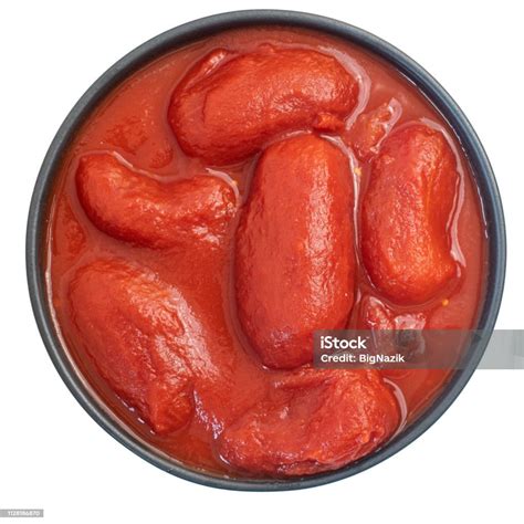 통조림된 한 토마토 그들의 자신의 주스에서 벗 겨 토마토와 그릇을 갈색 백색에 절연 되어 있습니다 상위 뷰 토마토 채소에 대한