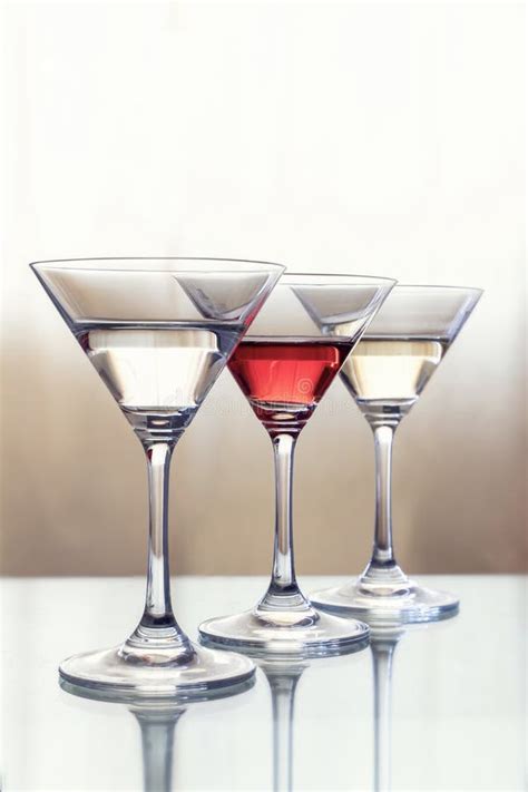 Three Cocktail Glasses With Beautiful Triangular Glasses Concept For