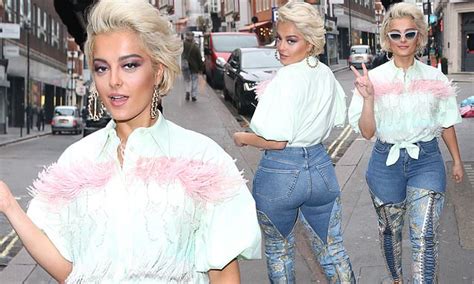Bebe Rexha Shows Off Her Derriere In Very Fitted Jeans And Thigh High