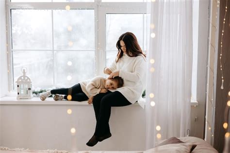 Premium Photo Mother And Daughter Winter Holidays
