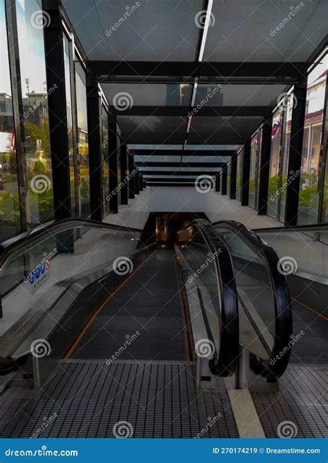 Escalator View From Below Blue Background Inside Royalty Free Stock