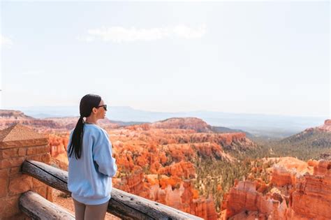 Premium Photo Hiker Woman In Bryce Canyon Hiking Relaxing Looking At