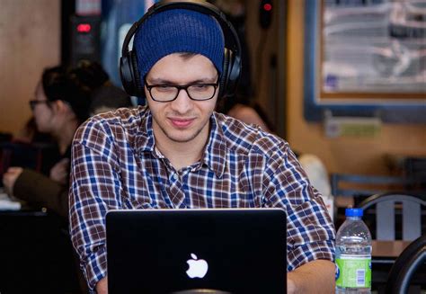 People Man Using Macbook During Daytime Human Image Free Photo