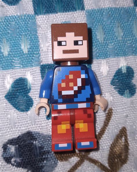 Is This A Glistering Melon Slice Or A Book On This Minifigure Shirt