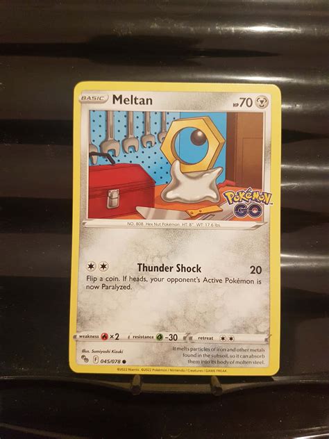 Download Meltan Pokémon Card Wallpaper