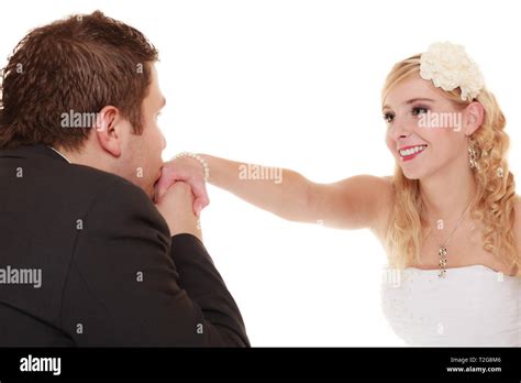Wedding Day Male Groom Kissing Hand Of Female Bride Isolated On White