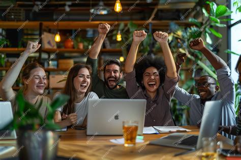 Premium Photo Excited Team Celebrating Success At Work With Ai Generated