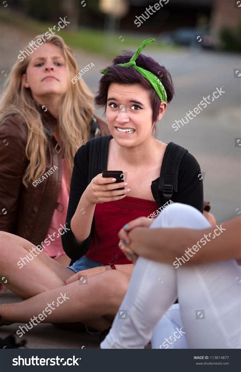 Embarrassed Teenage Girl Holding Phone Outside Foto Stok 113814877 Shutterstock