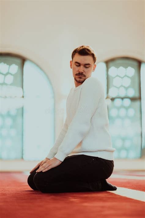 A Muslim Praying In A Modern Mosque During The Holy Muslim Month Of