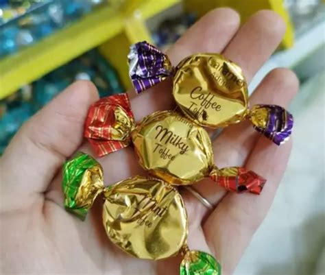 تافی کره ای مغزدار کارامل میکس آدرین کارملایک کیلویی تانیل شاپ