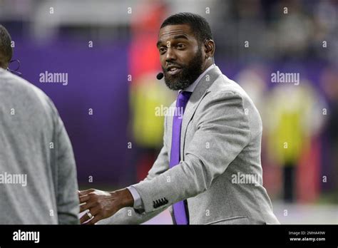 Espn Monday Night Countdown Personality Randy Moss Stands On The Field