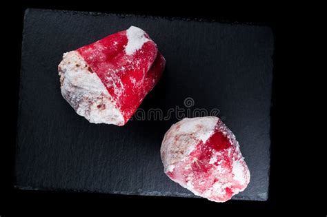 Frozen Stuffed Peppers On A Stone Plate On A Black Background Isolate
