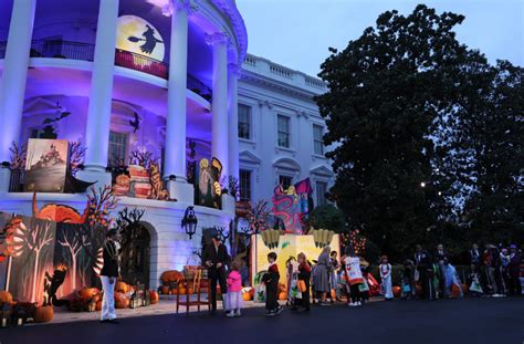 Biden And Jill Biden Hand Out Books And Candy While Hosting Thousands