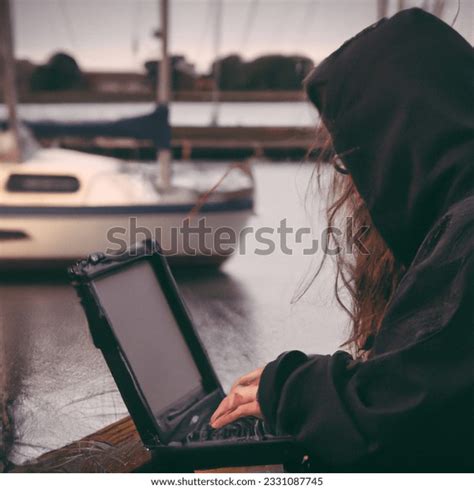 Photo Showing Female Hacker Working On AI Generated Image Shutterstock