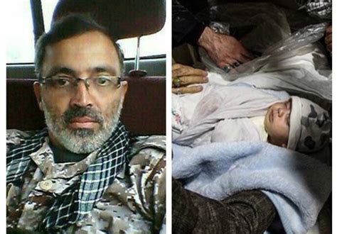 خبرگزاری تسنیم وداع فرزند ۴۰ روزه شهید مدافع حرم با پیکر پدر عکس