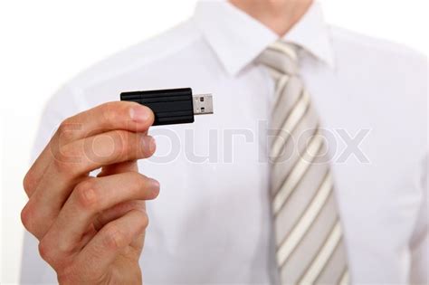 Businessman Holding USB Stick Stock Photo Colourbox