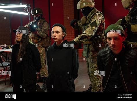 Three Arrested Cyber Criminals With Officers In Military Outfit Behind