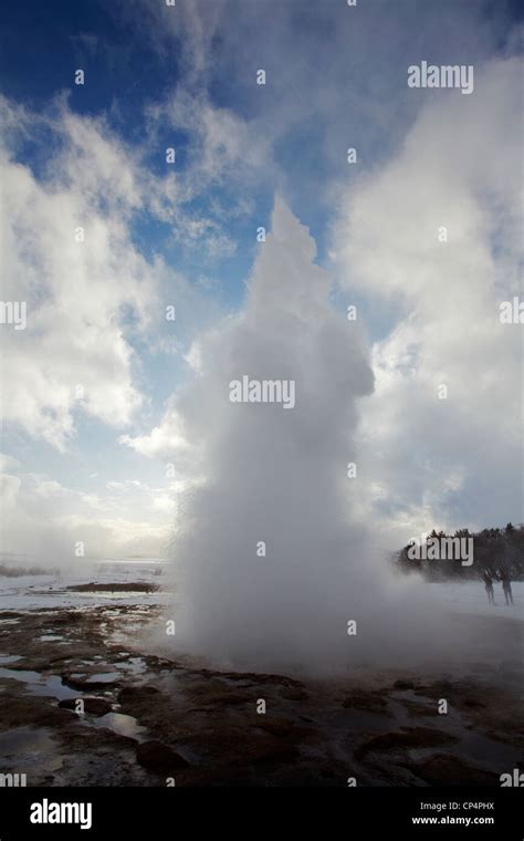 Strokkur Fountain Geyser Exploding Into The Air And Backlit By The Sun