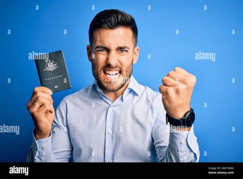 Young Handsome Tourist Man Holding Australia Australian Passport Id