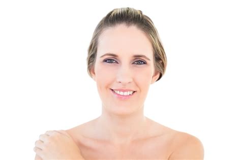 Premium Photo Smiling Woman With Hand On Shoulder Looking At Camera