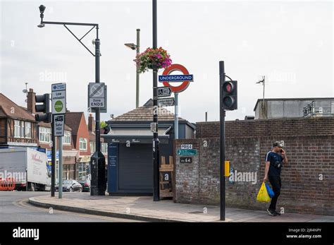Northwood Underground Station Roundel Sign Amidst Street Signs And