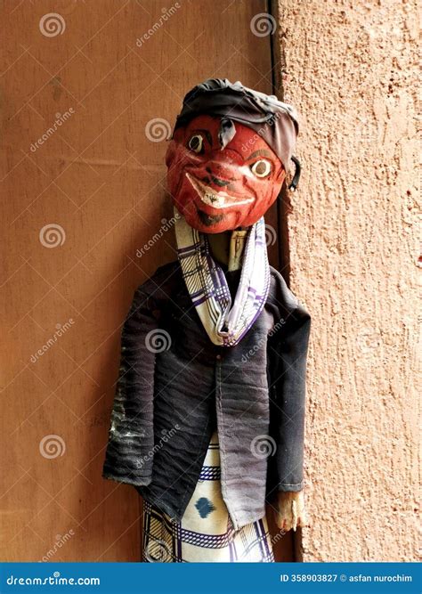 Wooden Wayang Mask With Batik Texture In Detail Stock Image