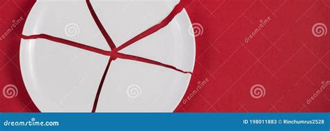 Broken Plate Or Broken Water Glass On The On The Red Background The