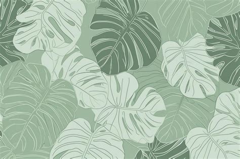 Un papel tapiz verde con un patrón de hojas Foto Premium