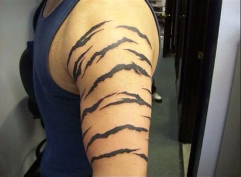 10 Best Tiger Stripes Tattoo Ideas And Designs Tiger Inspired