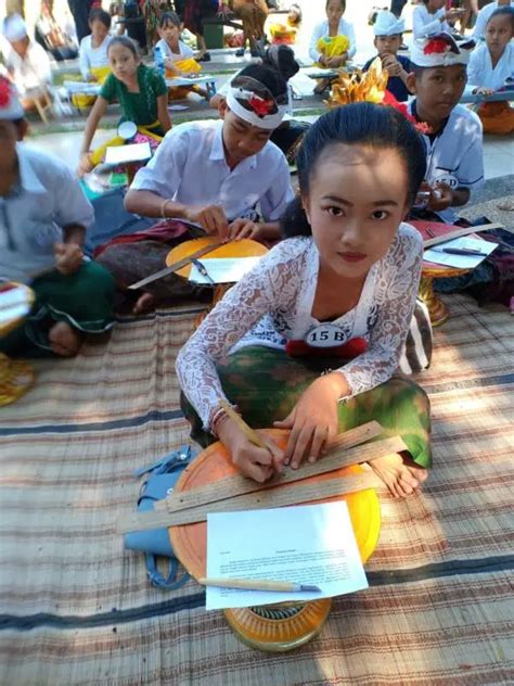 A Balinese Script Writing Festival Fivehead Scrolller