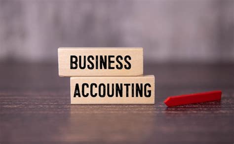 Premium Photo Text Business Accounting Text On Sticky On Keyboard Business Concept