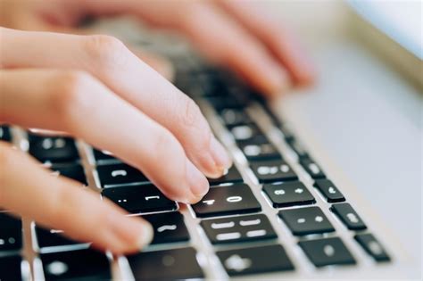 Hands Typing On Keyboard With Digital Literacy Materials And Network Visualization Premium Ai