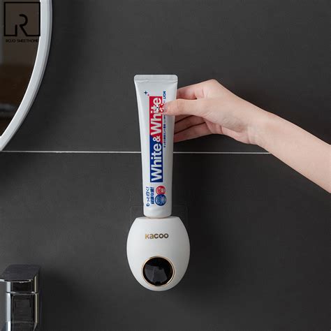 Badu Bg Автоматичен диспенсер за паста с формата на яйце Бяла тръба търкаляща се дентална преса