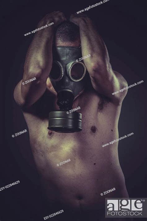 Concept Of Risk Of Contamination Naked Man With Gas Mask Stock Photo
