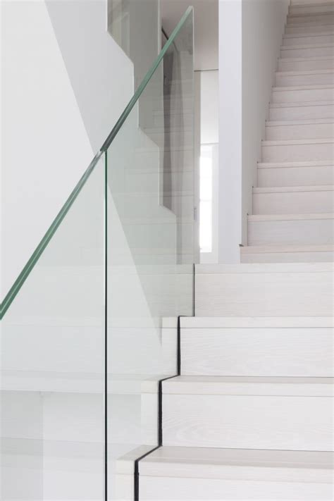 Glass Box Defines Extension With Basement Pool To Victorian Home In