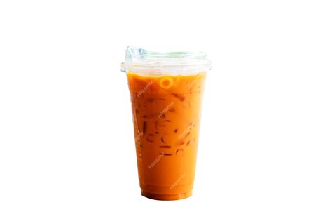Premium Photo Iced Thai Milk Tea In A Plastic Cup Isolated On White