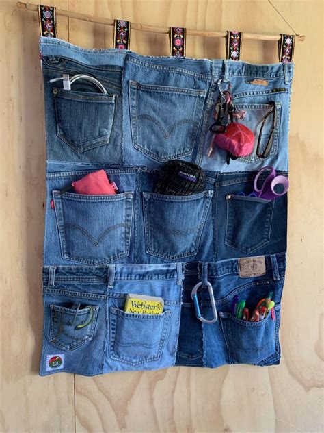 Jeans Upcycled Into A Wall Organizer Recycle Denim Diy Easy Denim Upcycle Upcycle Projects