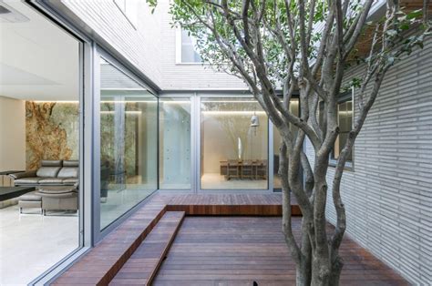 Steel Poles Screen Living Spaces And Gardens At South Korean Home
